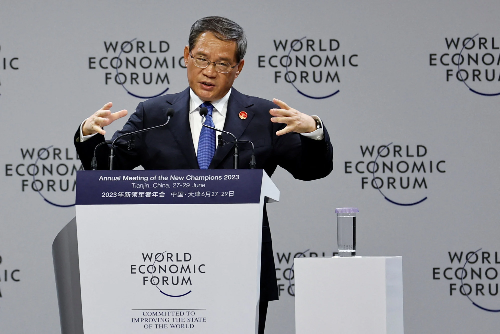 Li urges global cooperation, vows continued opening-up at WEF ...