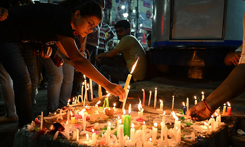 Moumita Debnath rape-murder case: Indians demand justice in candlelight ...